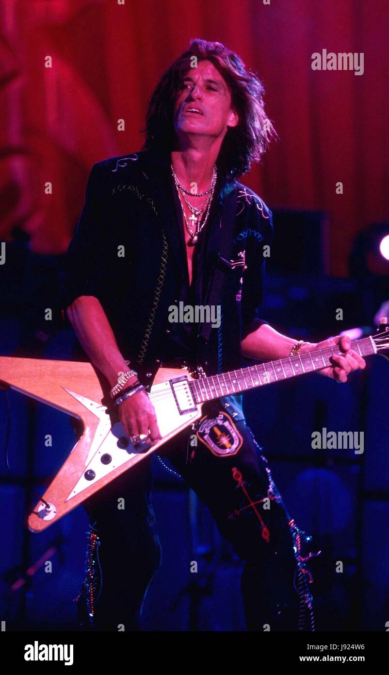 Aerosmith performing on stage at PNC Arts center in NJ. 8/13/02 The ...