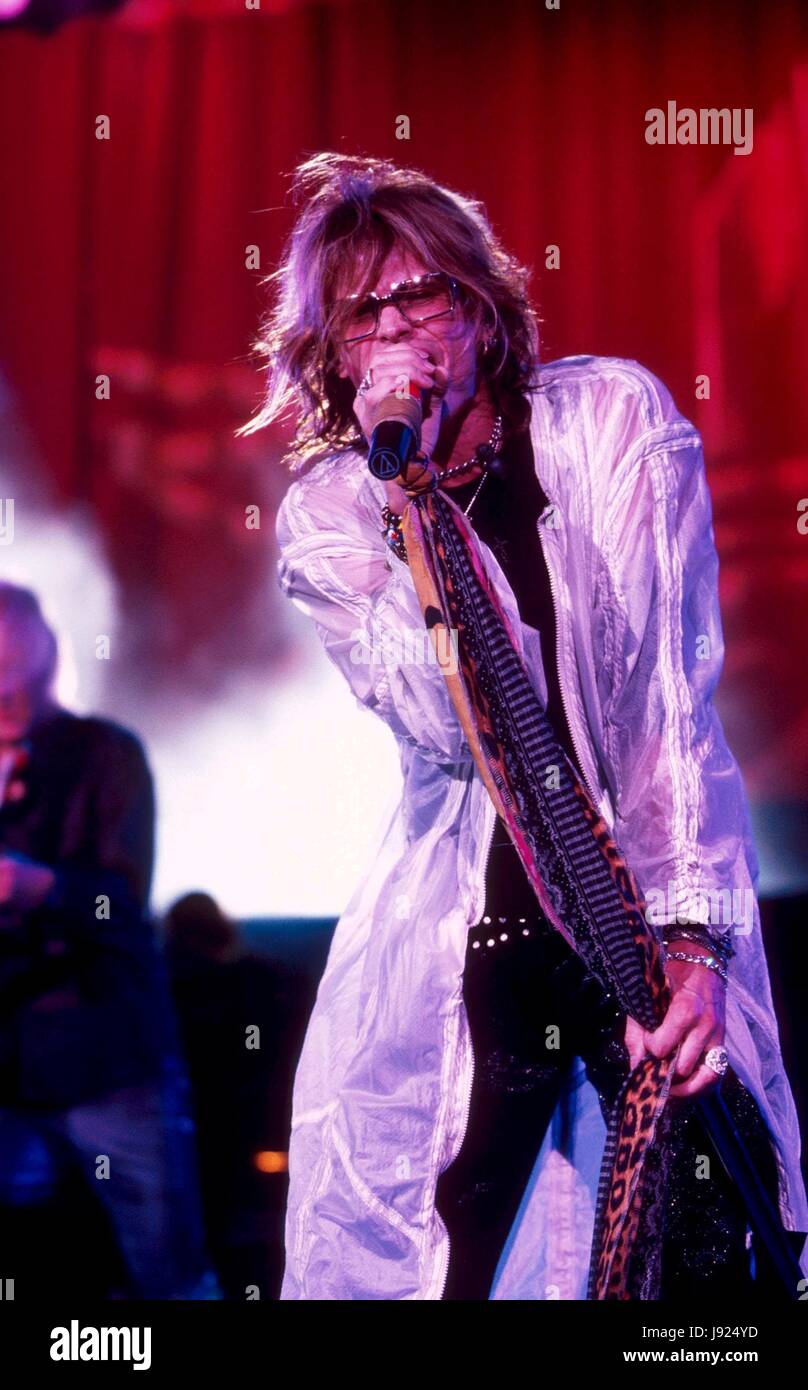 Aerosmith performing on stage at PNC Arts center in NJ. 8/13/02 The ...