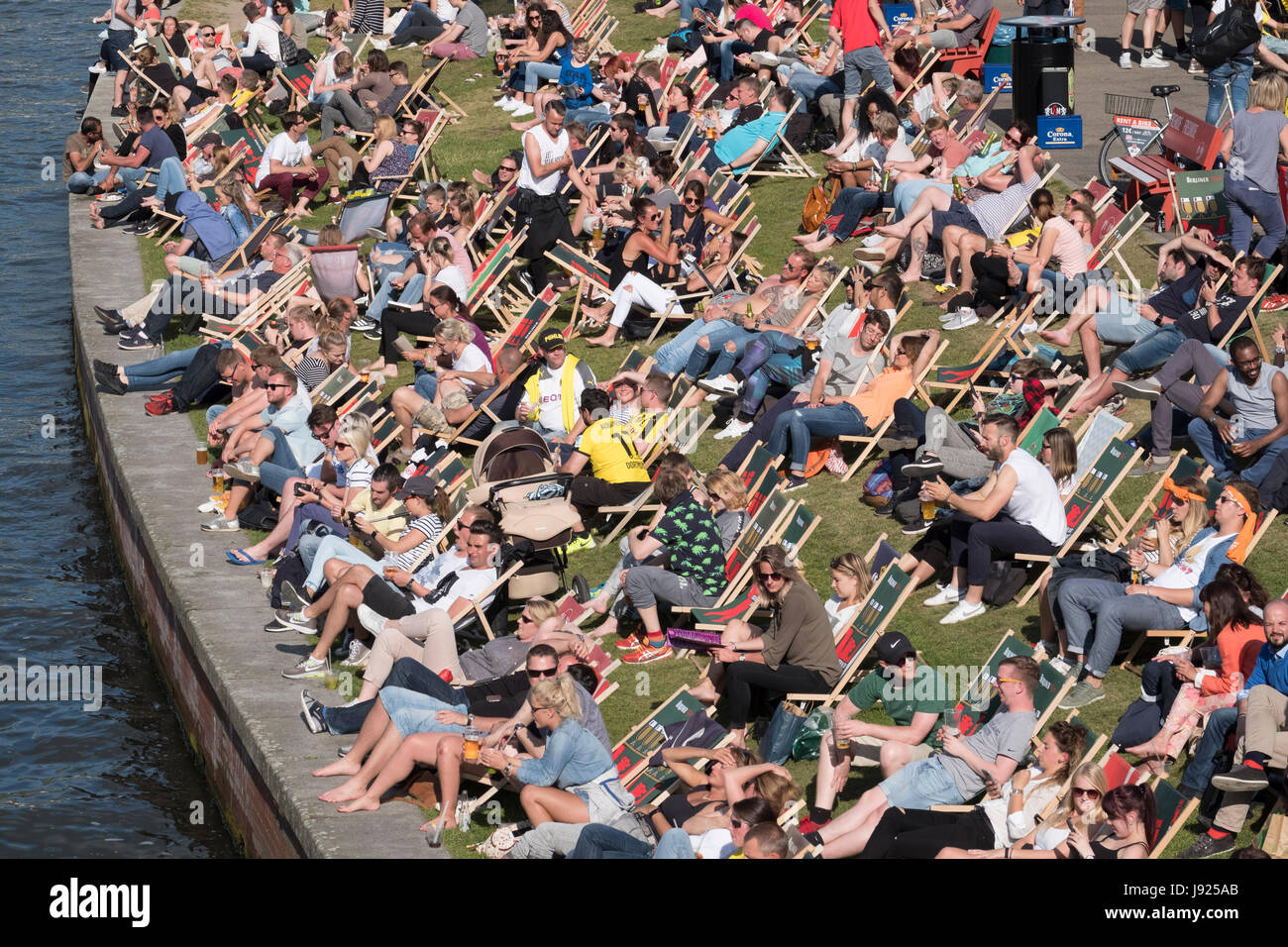 Outdoor riverside bar beside Spree River in summer in Berlin, Germany ...