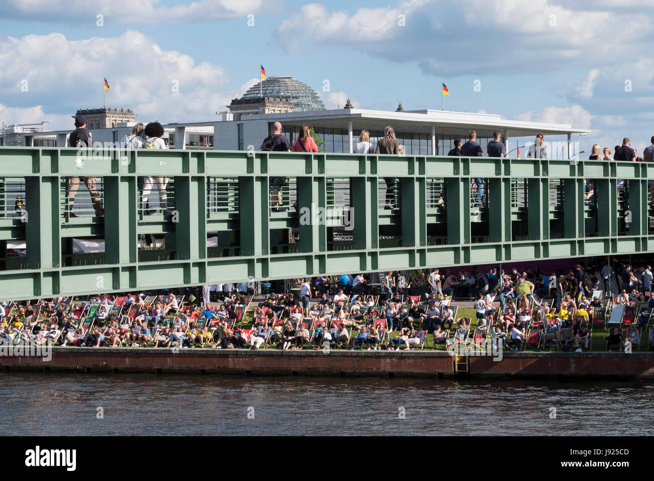 Outdoor riverside bar beside Spree River in summer in Berlin, Germany ...