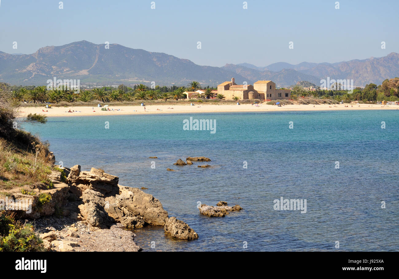 Beeautiful Nora beach and old cathedral view on Sardinia island in ...
