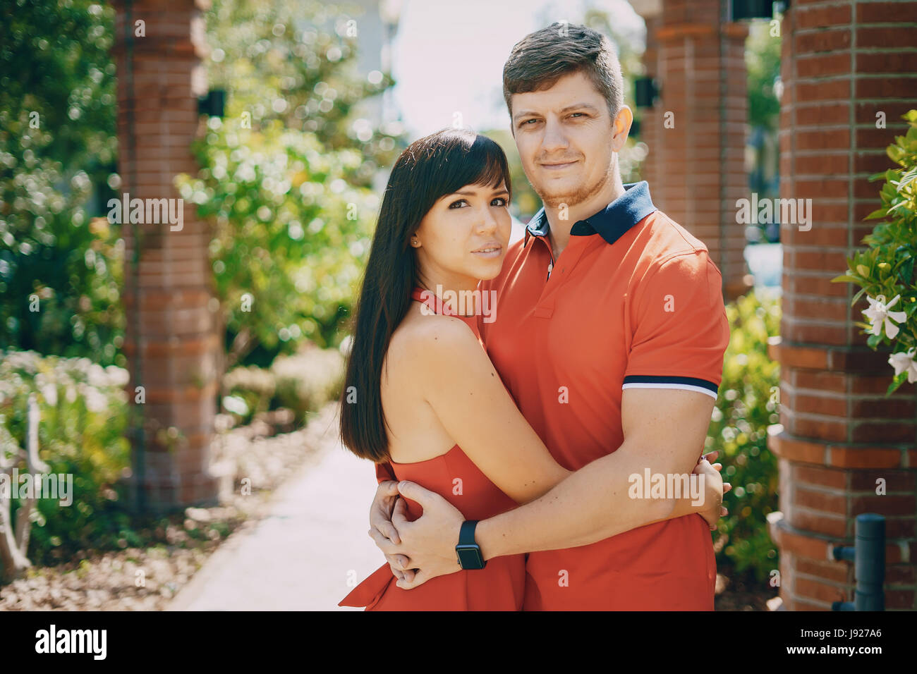 love couple red dress Stock Photo - Alamy
