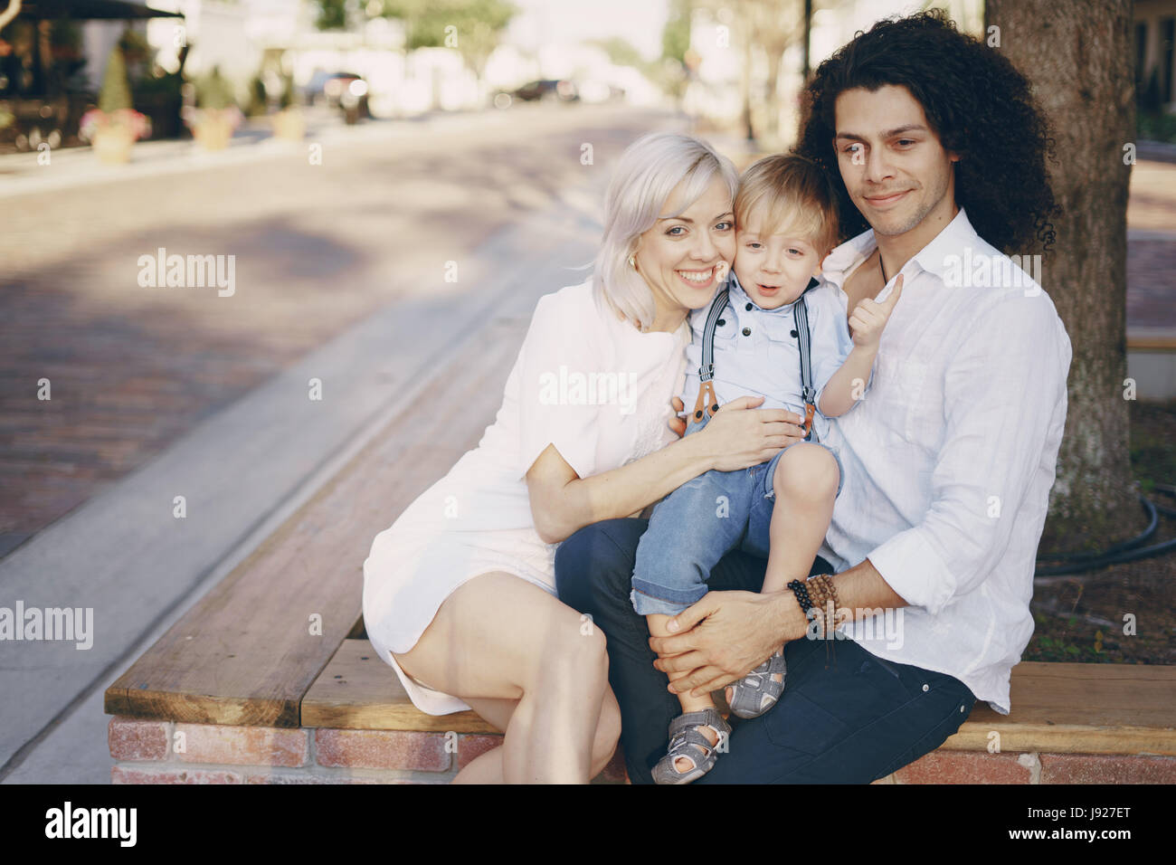 beautiful young family Stock Photo - Alamy