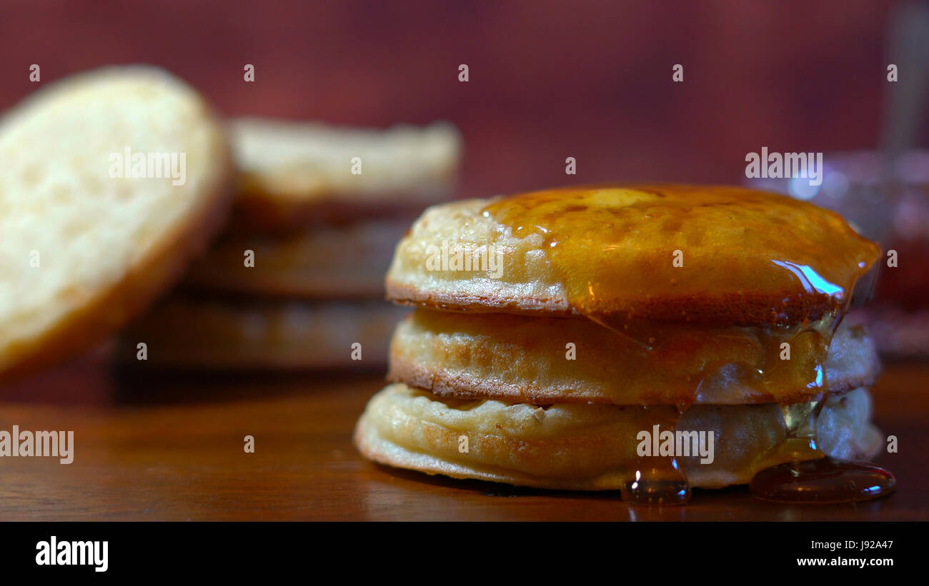 Crumpet with honey hi-res stock photography and images - Alamy