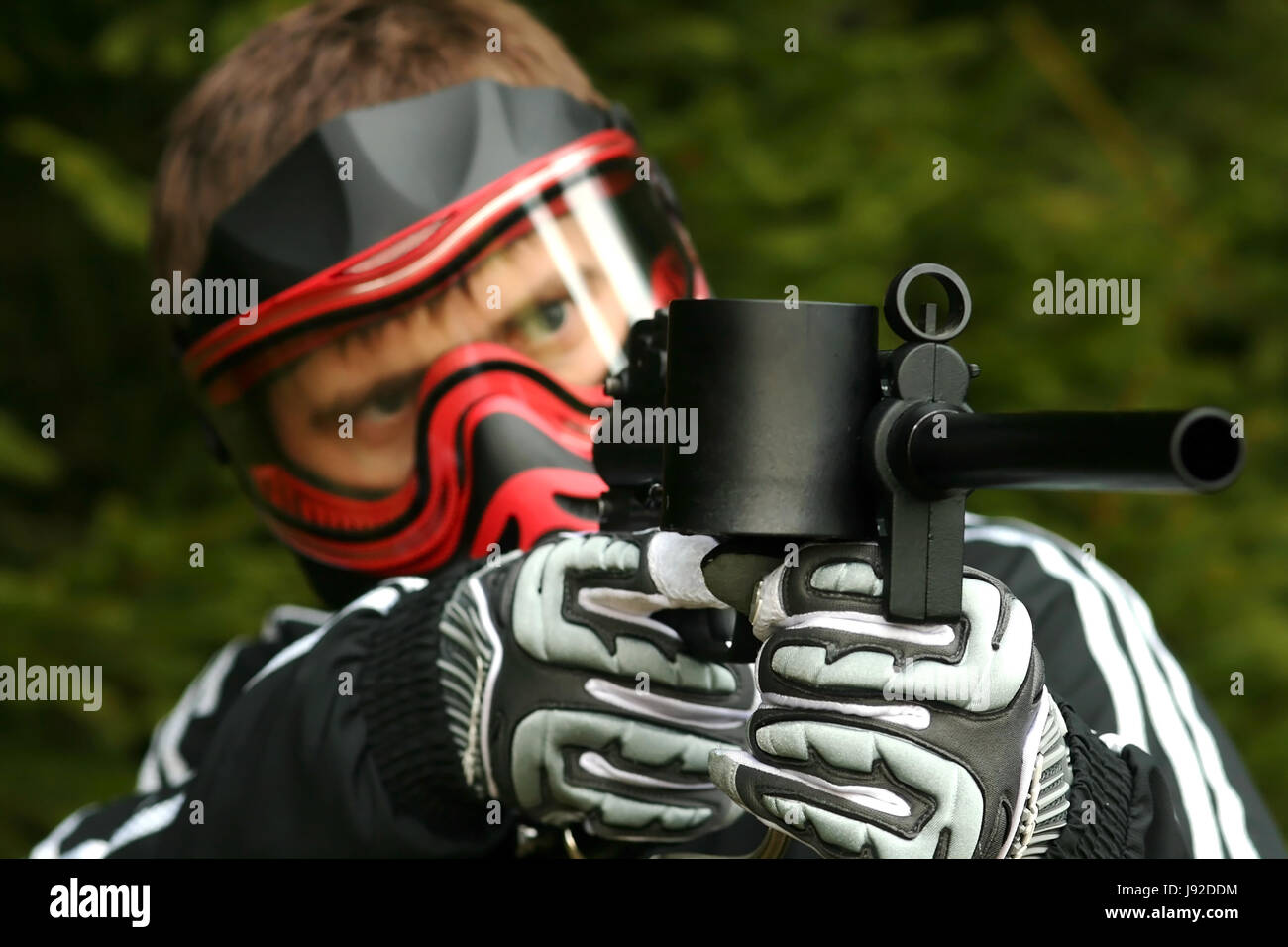 Teens play paintball hi-res stock photography and images - Alamy