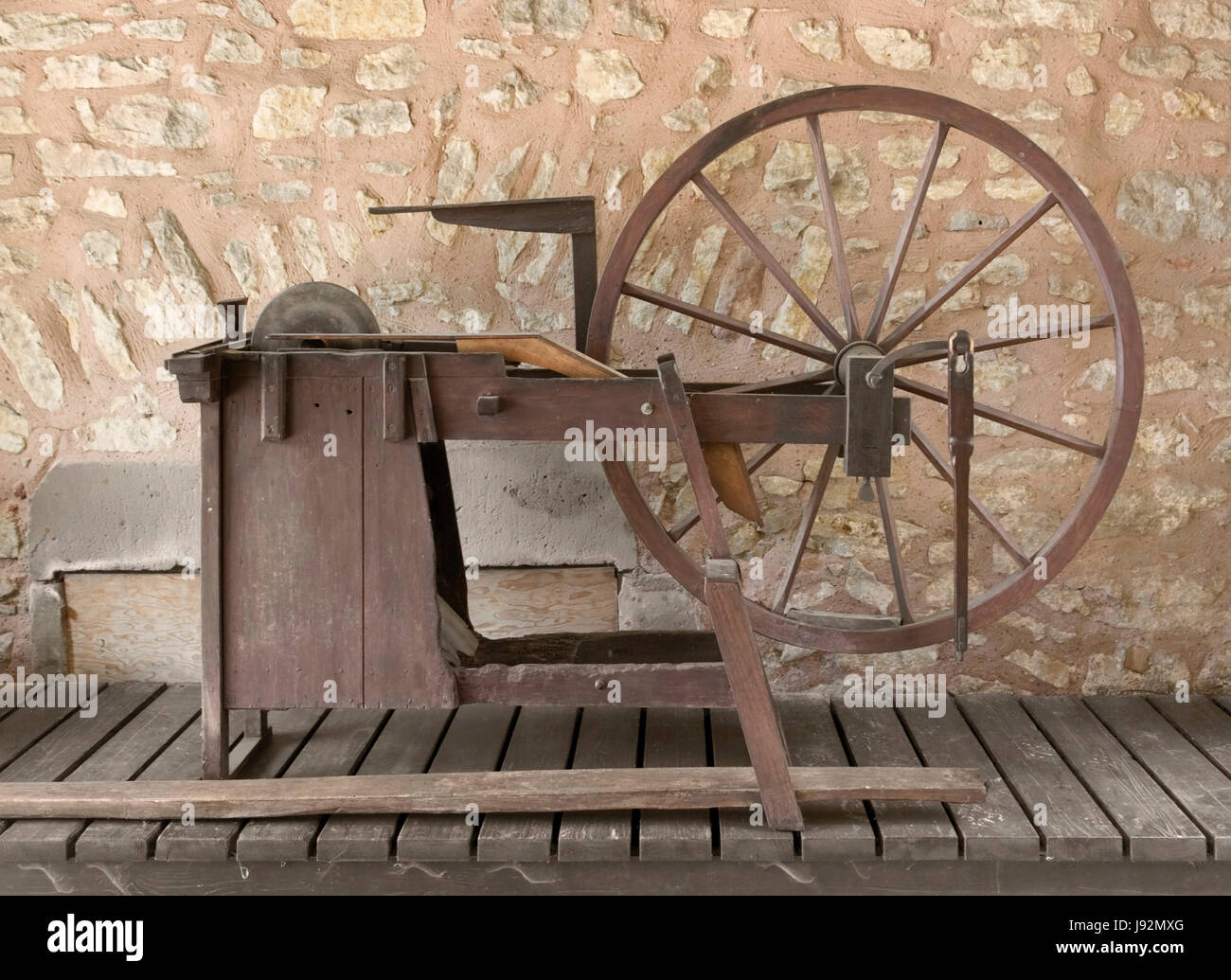 historic grinding wheel Stock Photo - Alamy