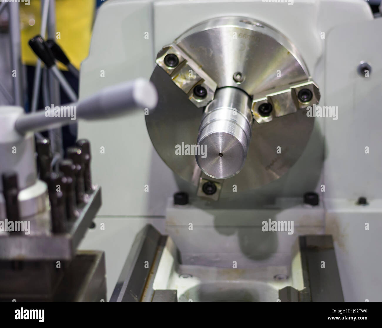 Close up chuck of a lathe machine Stock Photo - Alamy