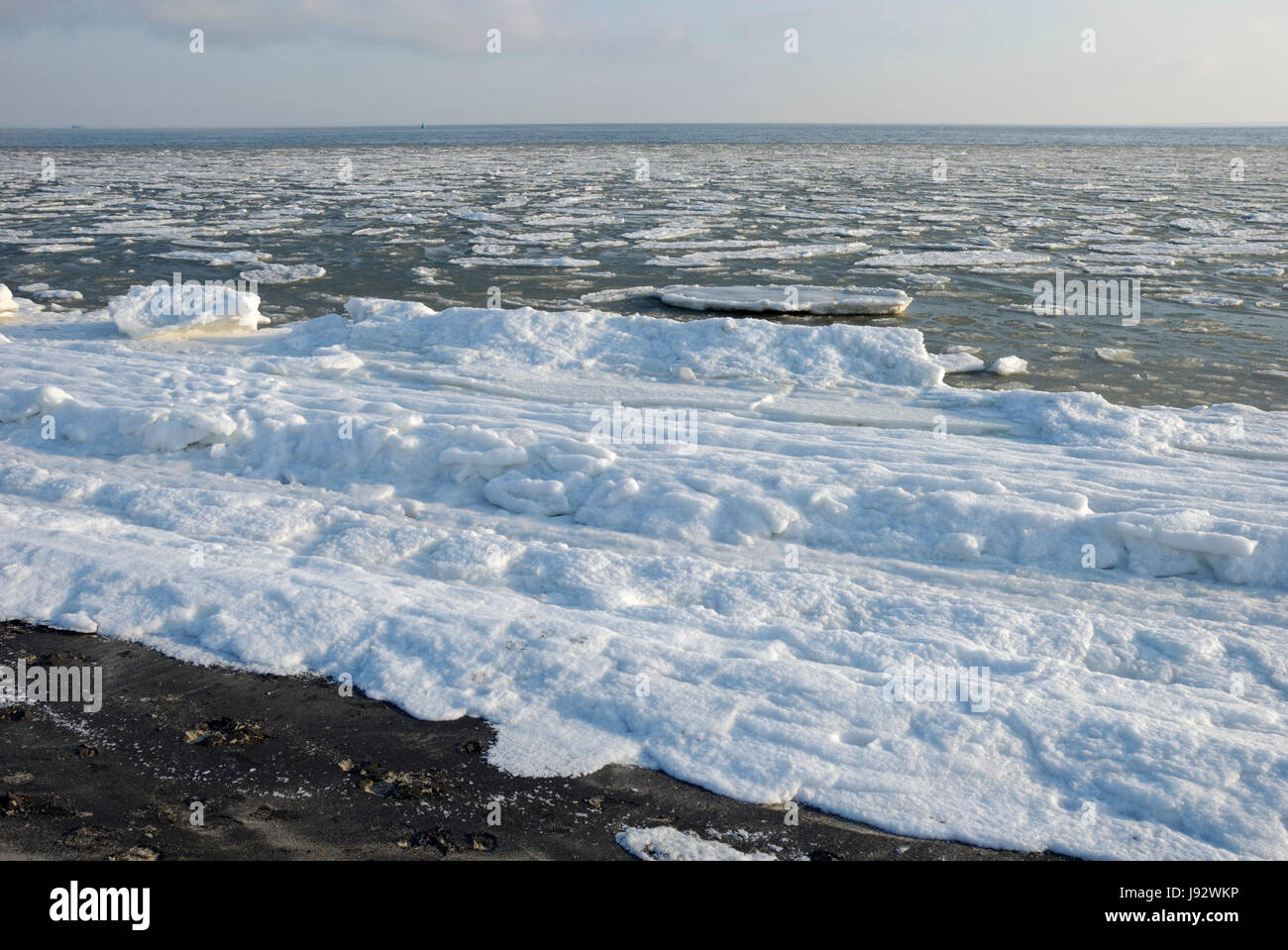 frozen surf on the beach of hrnum Stock Photo - Alamy