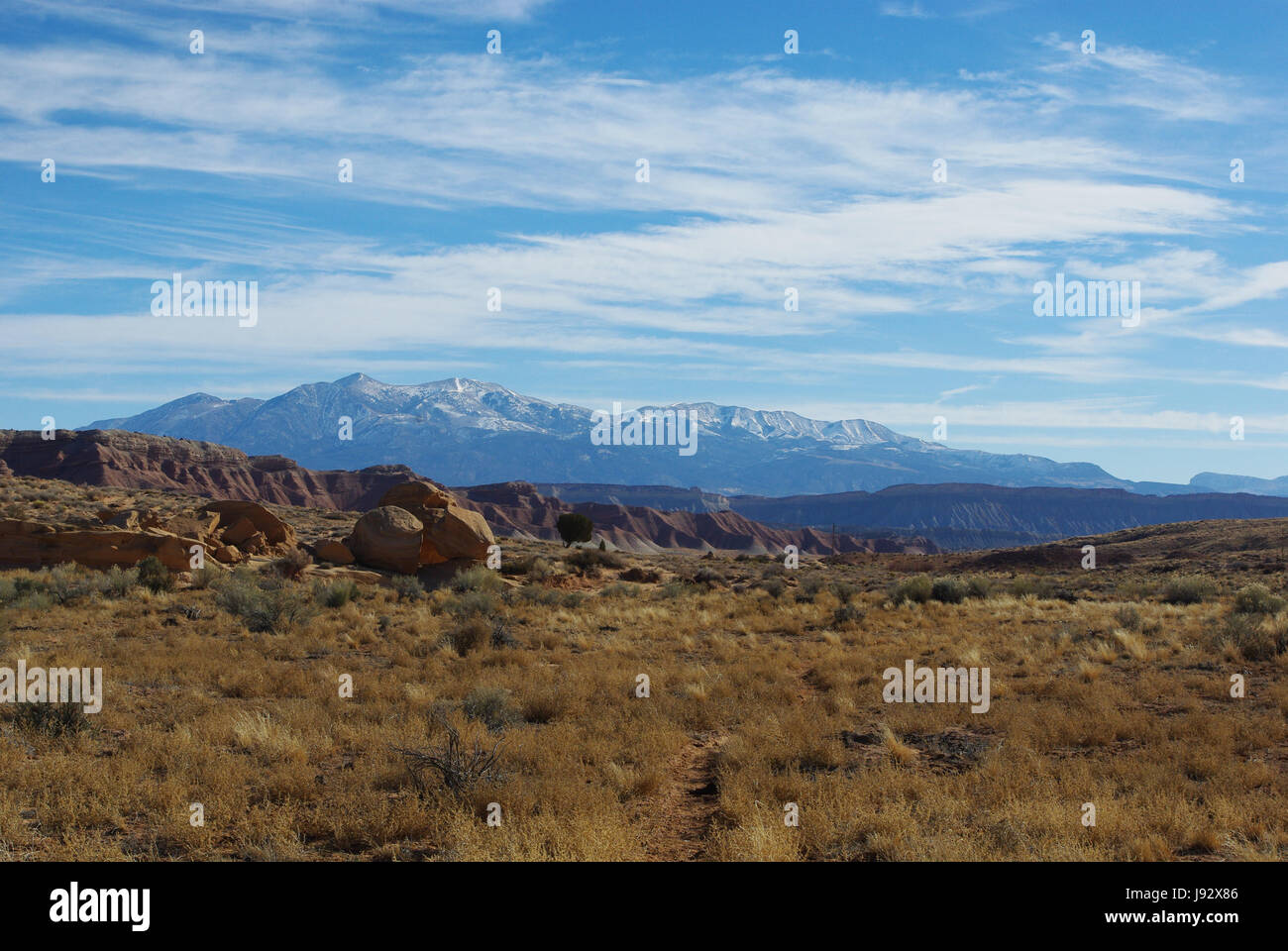 rocks,sand stone hills and henry mountains,utah Stock Photo - Alamy