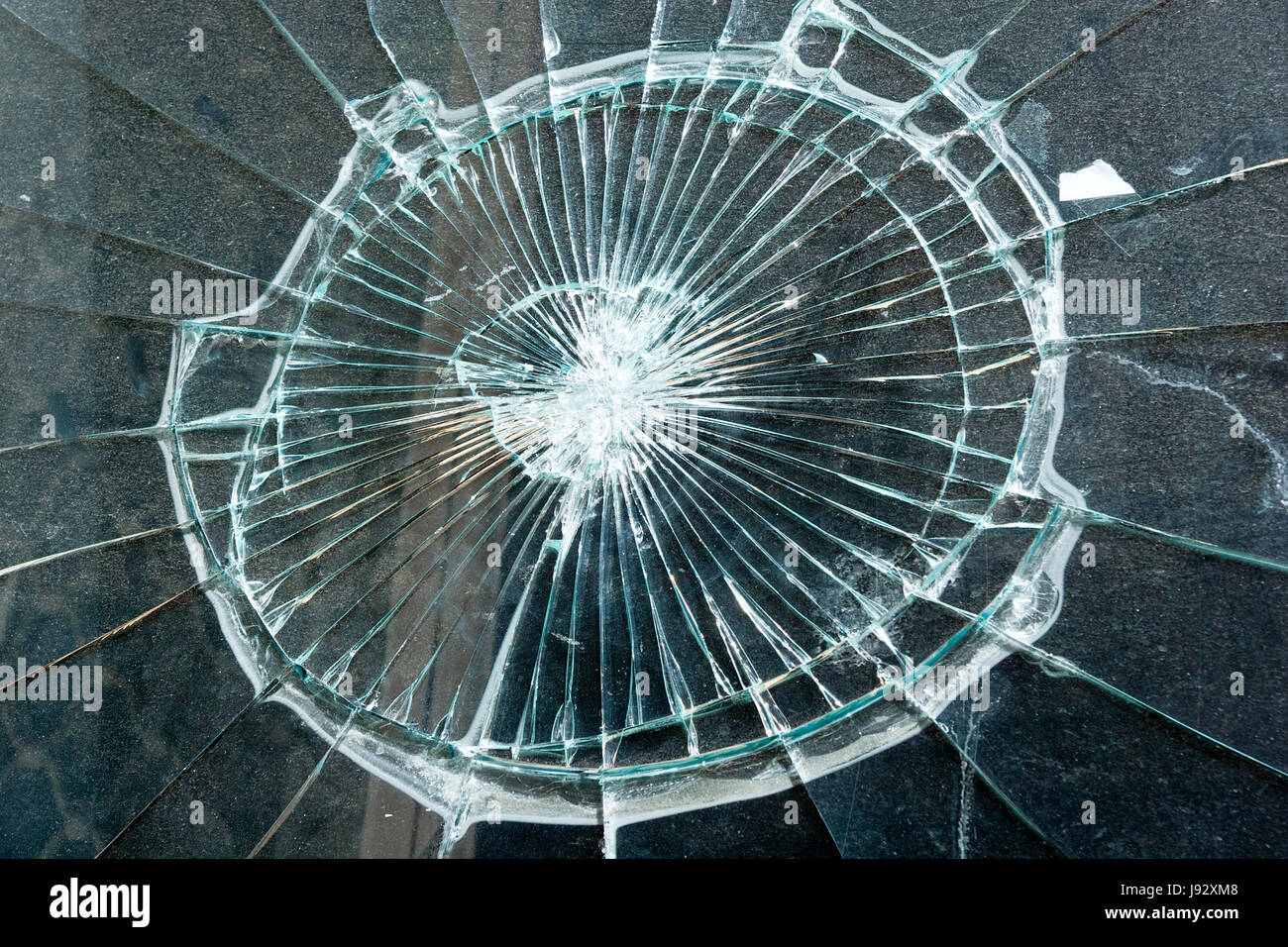 Shattered window glass Stock Photo - Alamy