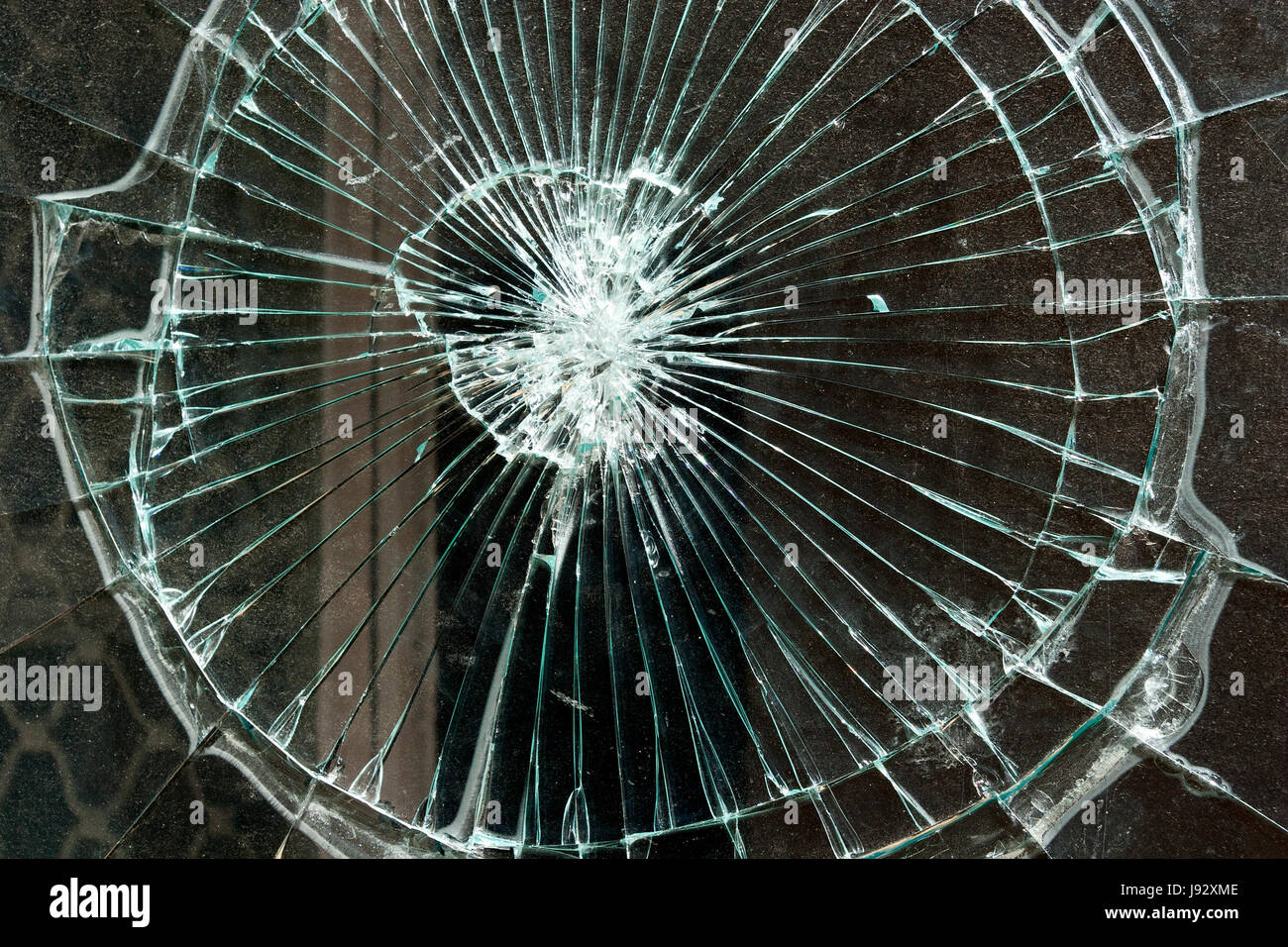 Shattered window glass Stock Photo - Alamy