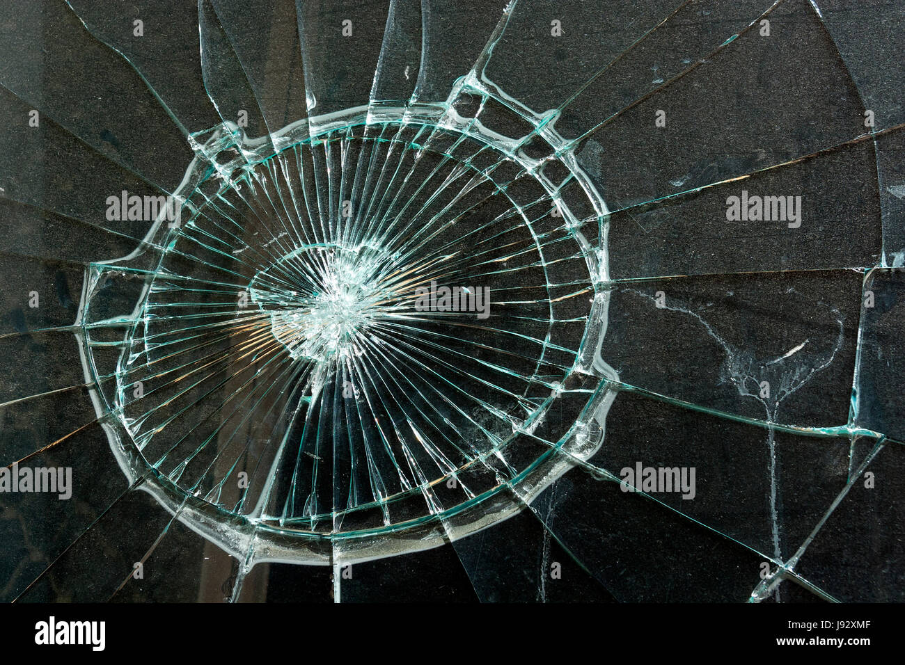 Shattered window glass Stock Photo - Alamy