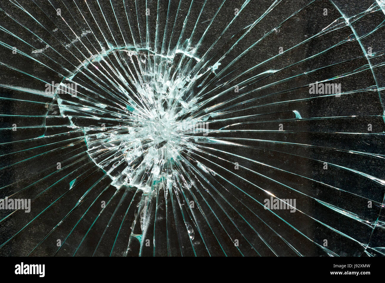 Shattered window glass Stock Photo - Alamy