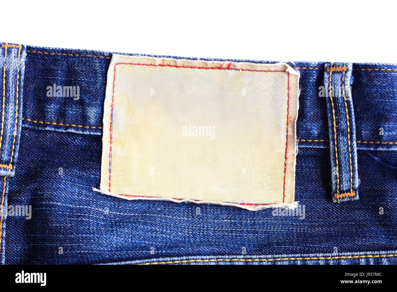 Blank canvas label back view of jeans isolated on white background ...