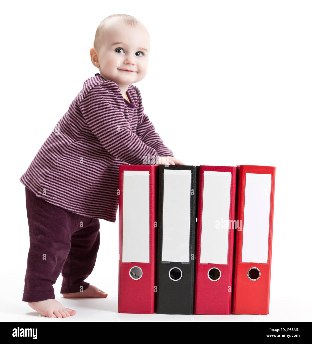 young child with four file folders Stock Photo - Alamy
