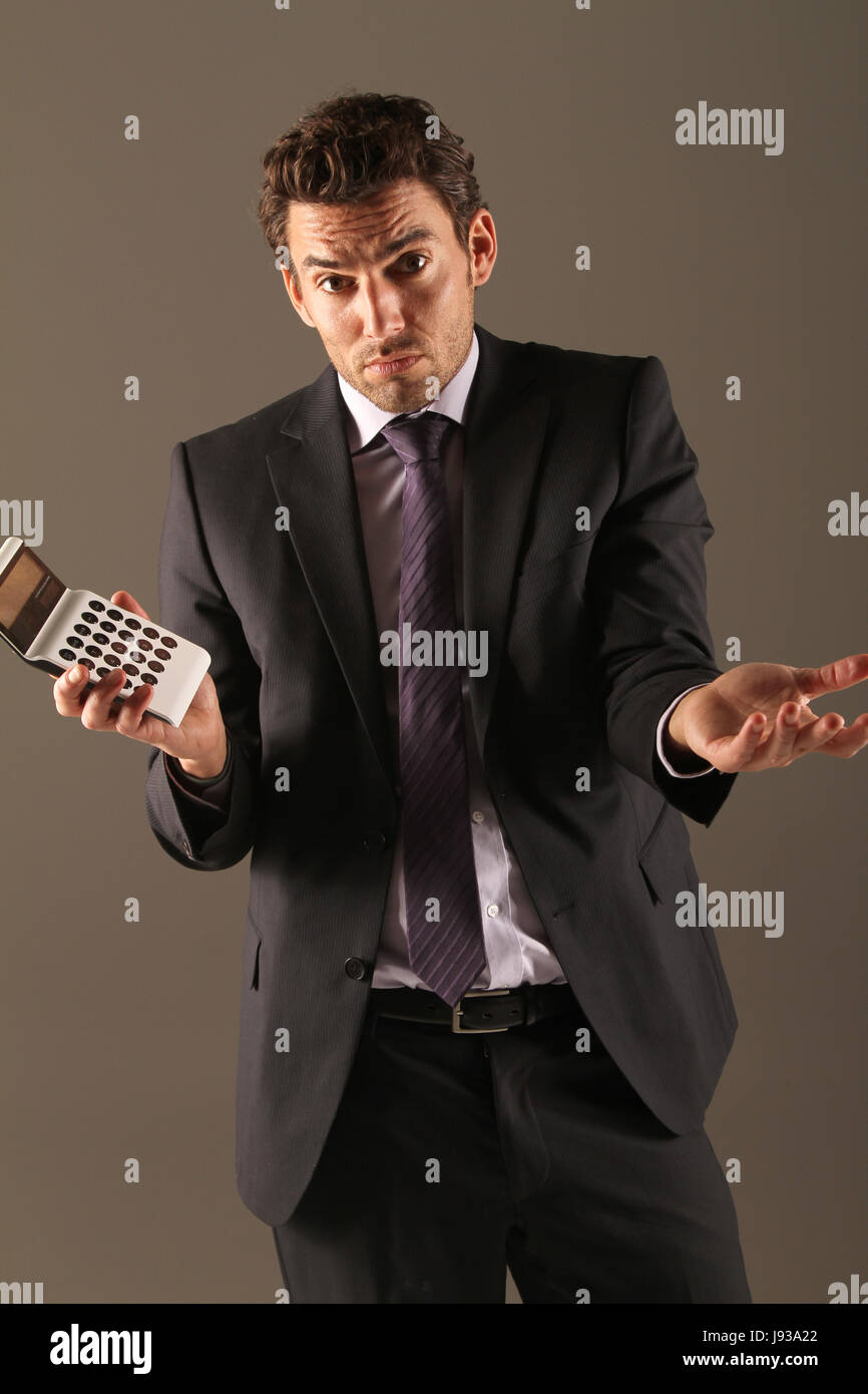 man with calculator Stock Photo - Alamy