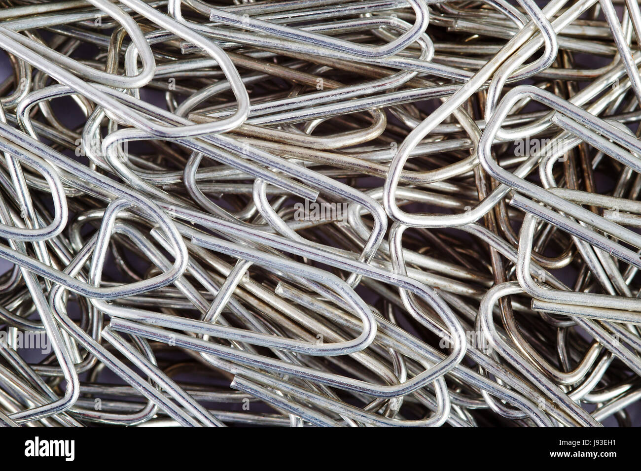 silver paper clips Stock Photo - Alamy