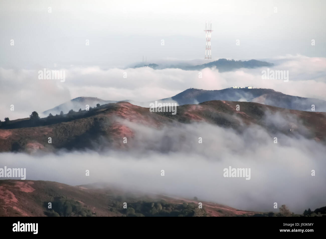Twin Peaks and Mount Sutro with Sutro Tower in Fog Stock Photo - Alamy