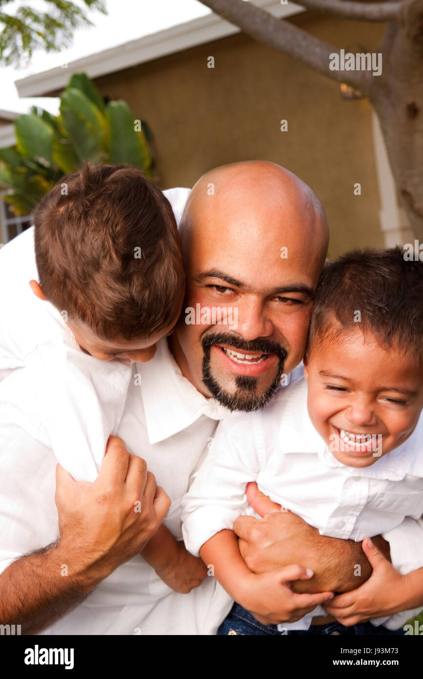 Father carrying son laughing and smiling Stock Photo - Alamy