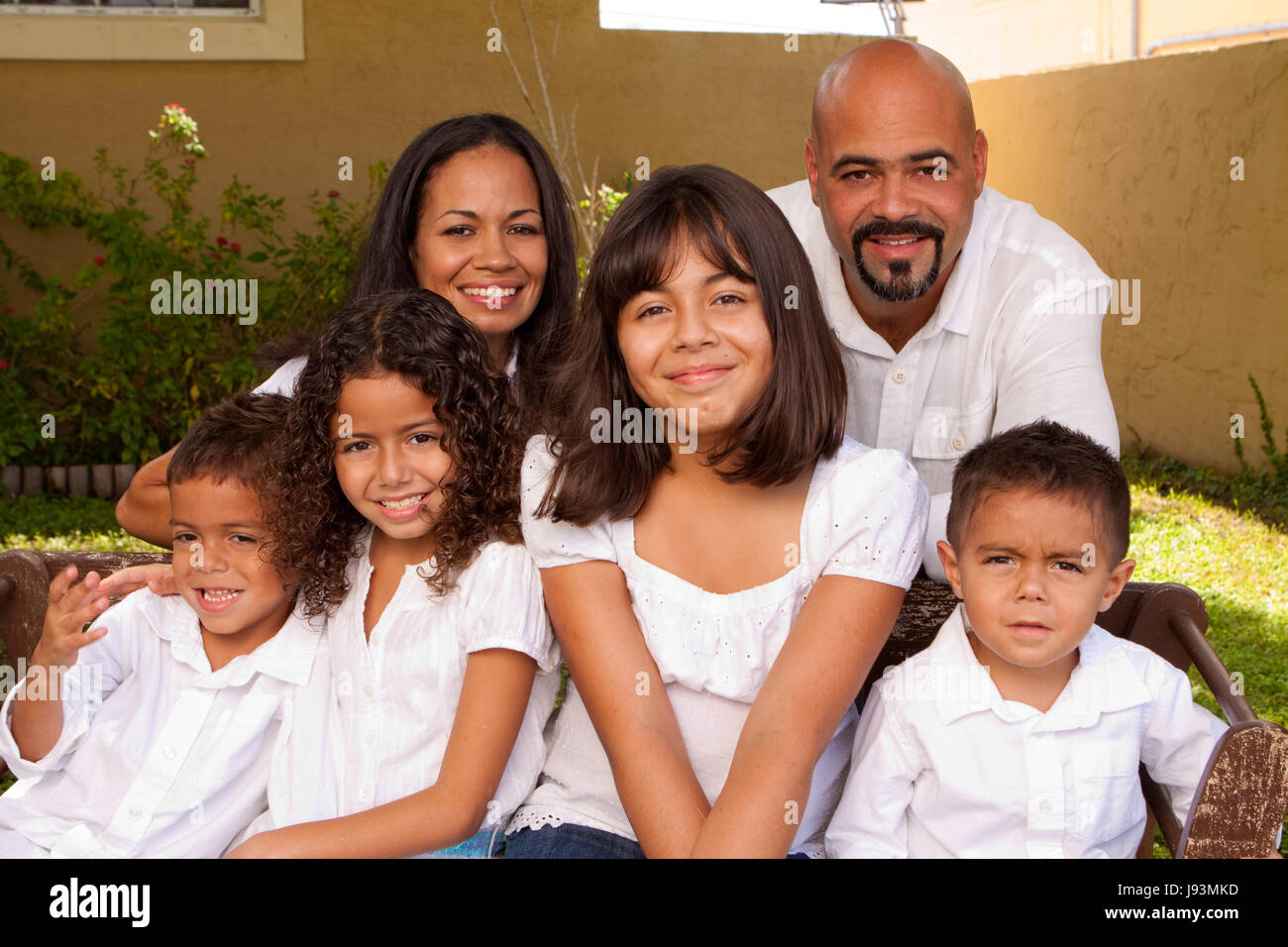 Happy Hispanic family laughing and smiling Stock Photo - Alamy