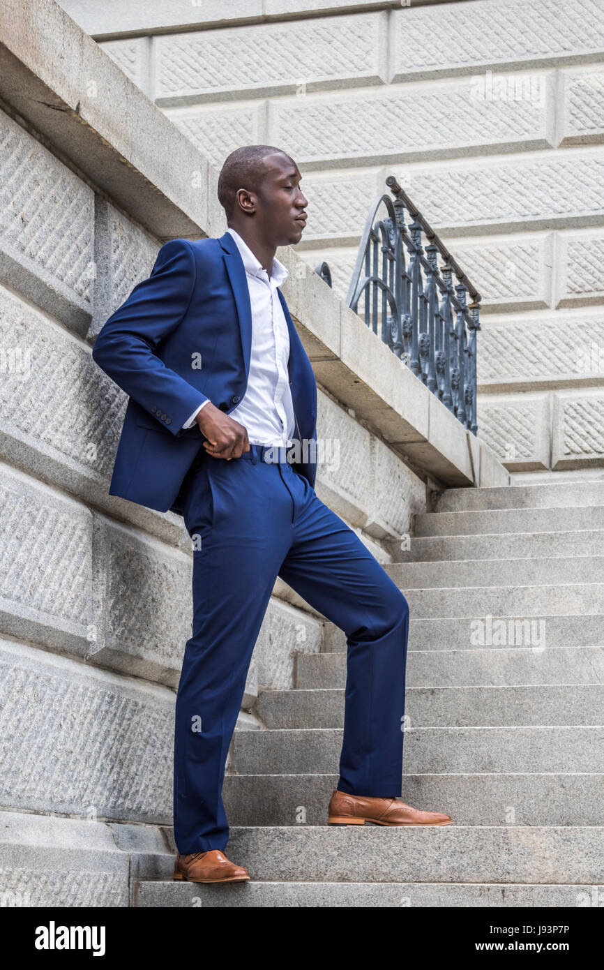 Man Standing on Steps Stock Photo - Alamy