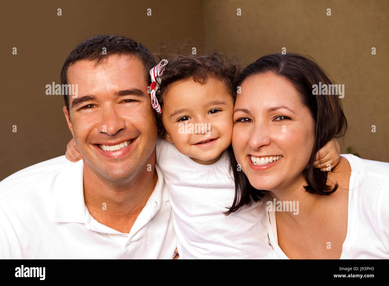 Happy Hispanic family laughing and smiling Stock Photo - Alamy