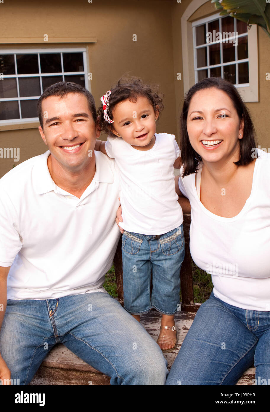 Happy Hispanic family laughing and smiling Stock Photo - Alamy