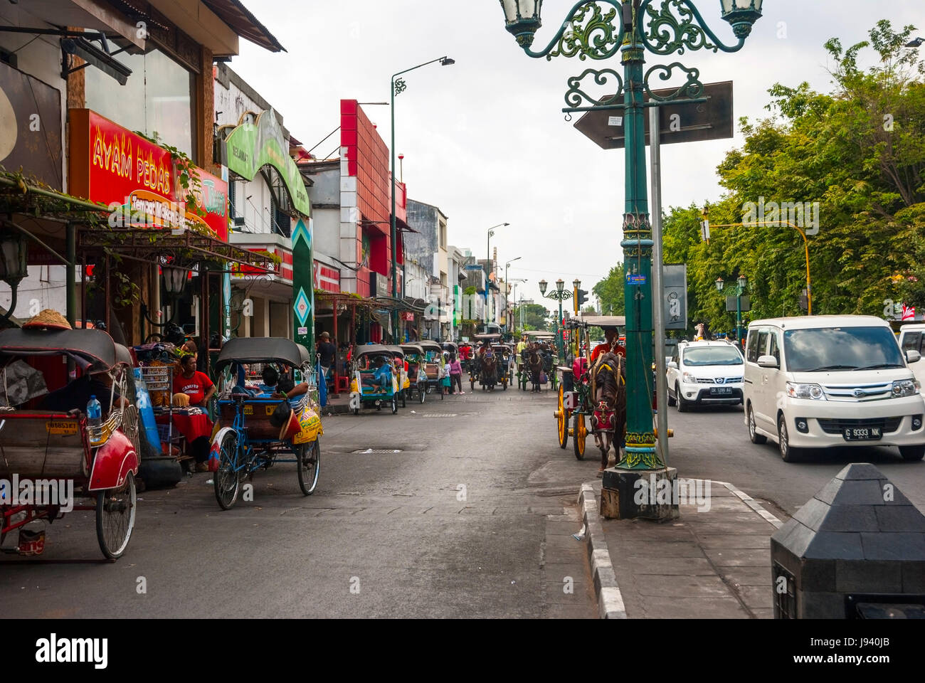YOGYAKARTA, INDONESIA - SEPTEMBER, 13: Main street in Yogjakrata full ...