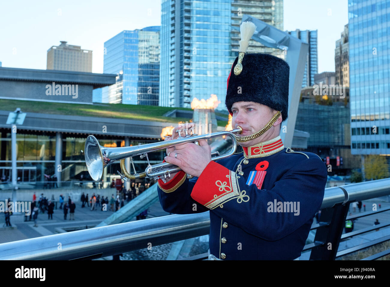 A bugler plays the last post to honour those who have been killed in ...
