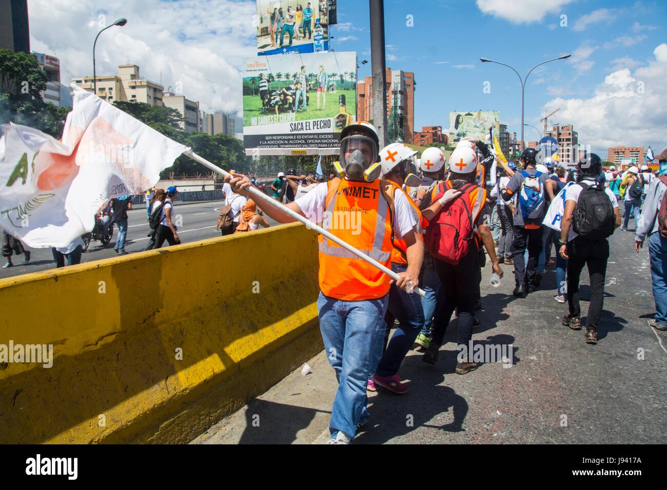 Group of students of first aid of the university UNIMET, move the flag ...