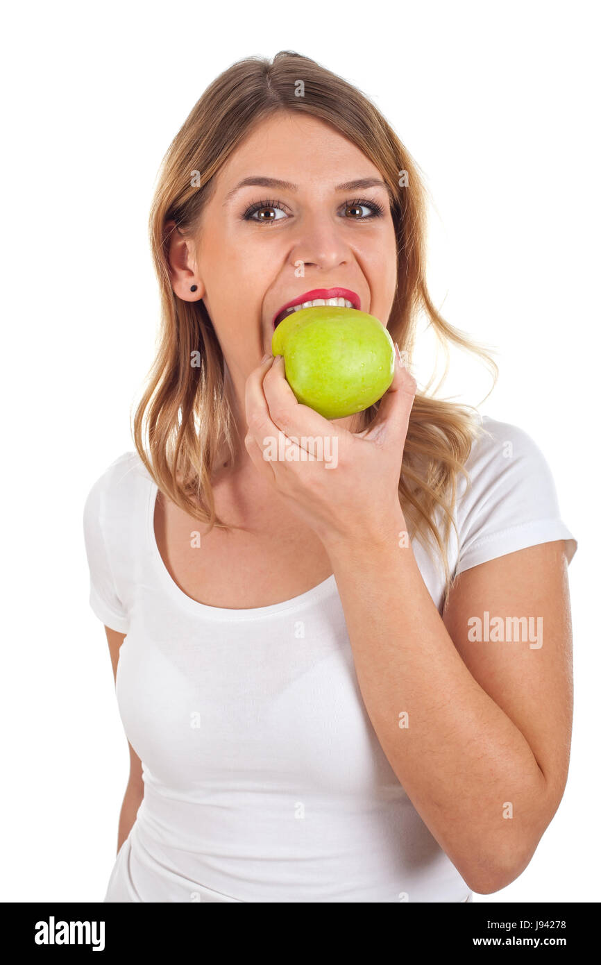Picture of a young woman biting of a huge apple Stock Photo - Alamy