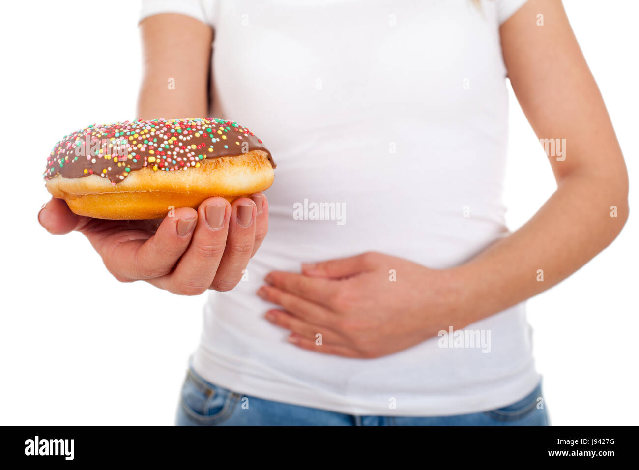Picture of a woman having indigestion from too much doughnuts Stock ...