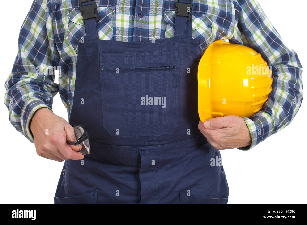 Close up picture of an engineer's hands holding his hat and a toggle ...