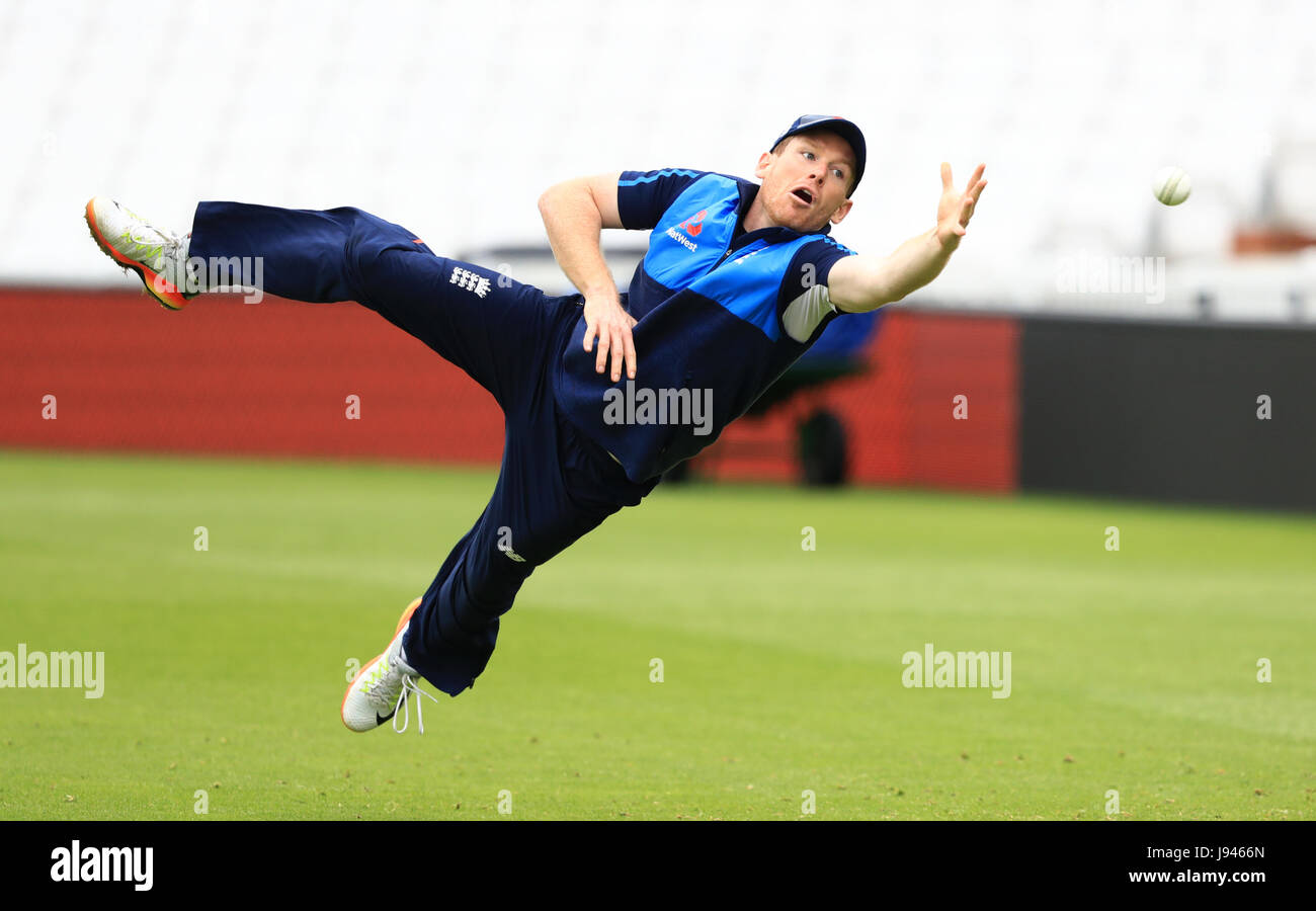 England's captain Eoin Morgan makes a flying catch during the nets session at the Ageas Bowl ...