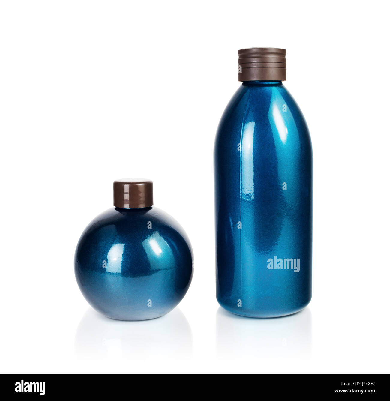Two blank blue cosmetic bottles on white background. Plastic bottle ...