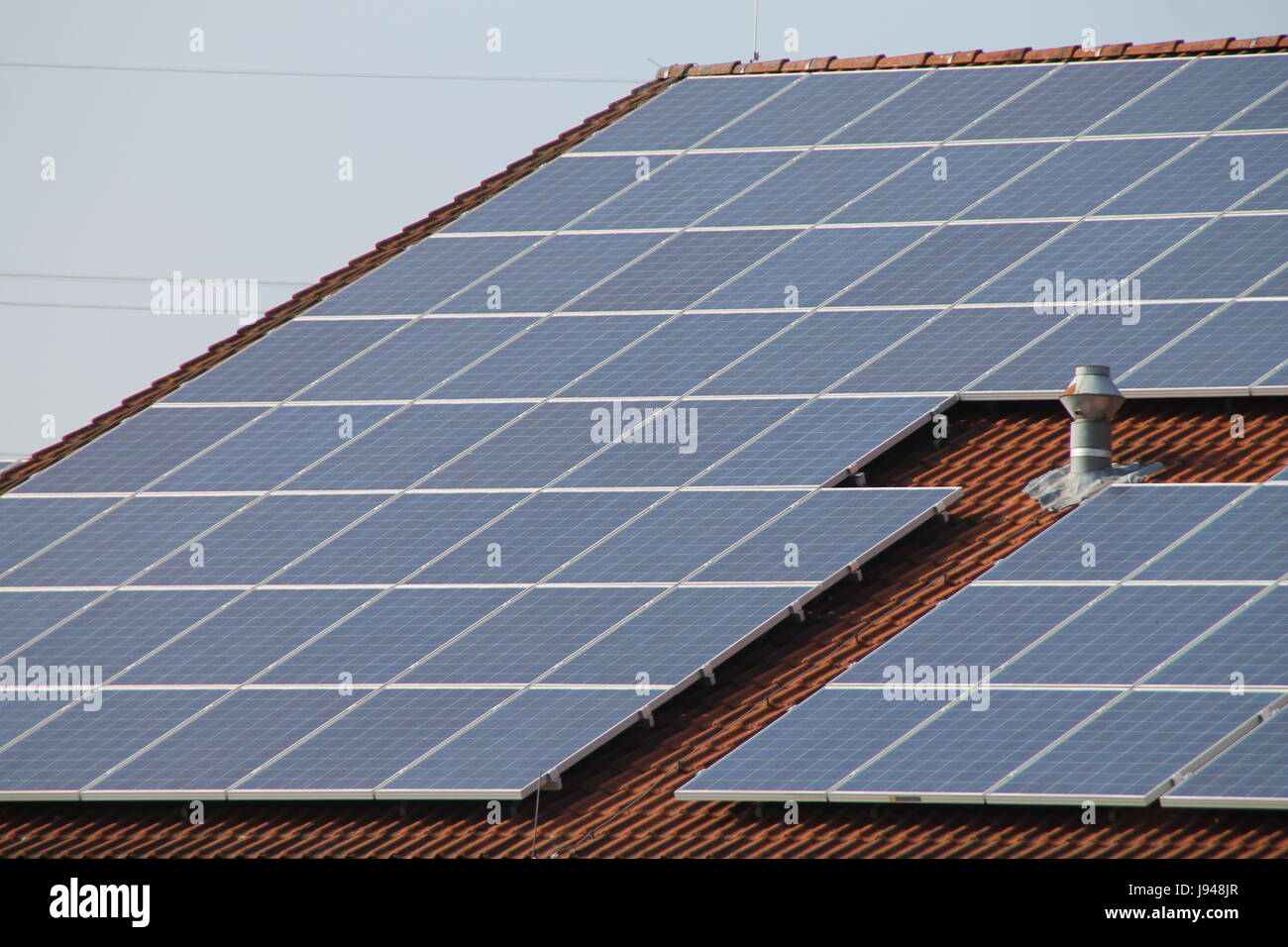 solar cells on a roof Stock Photo - Alamy
