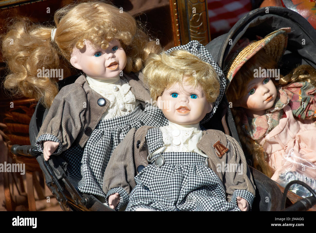 three old children dolls Stock Photo - Alamy