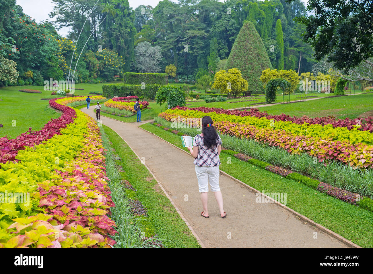 KANDY, SRI LANKA - NOVEMBER 28, 2016: The girl discovers the map of ...