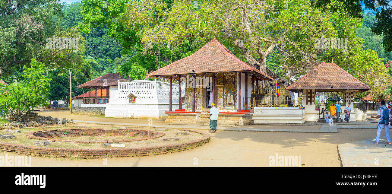 KANDY, SRI LANKA - NOVEWMBER 28, 2016: The decoradet shrines, old Bodhi ...
