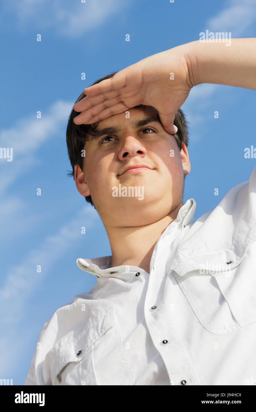 young man looking into the distance Stock Photo - Alamy