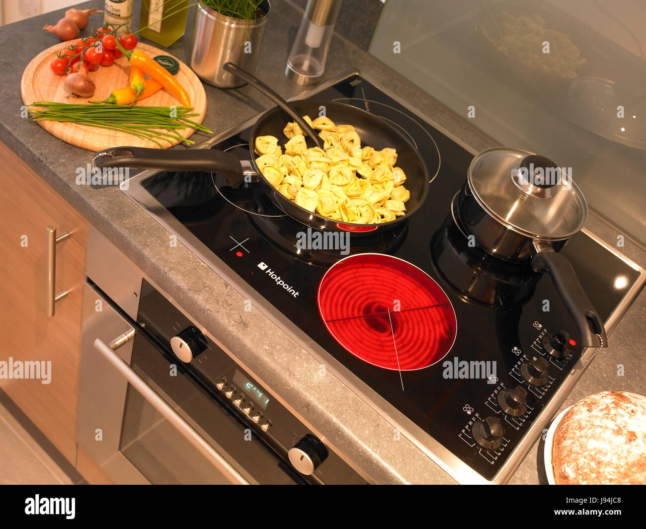 Cooker and oven hob in kitchen Stock Photo - Alamy