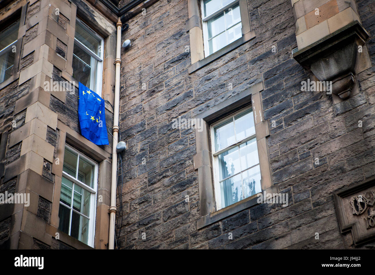 European Union flag hanging from window of Edinburgh apartment Stock ...