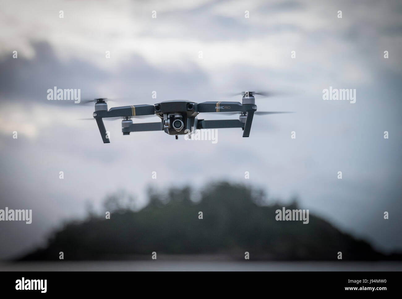 Drone hovering above an island in Australia. The use of drones while ...