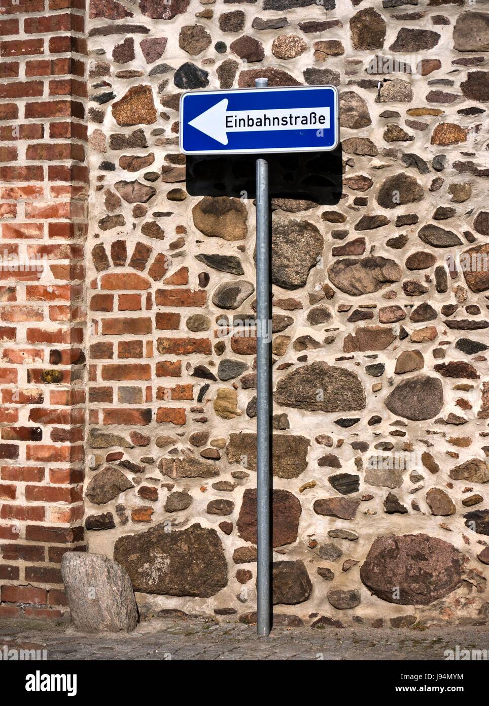 way street-stone wall Stock Photo - Alamy