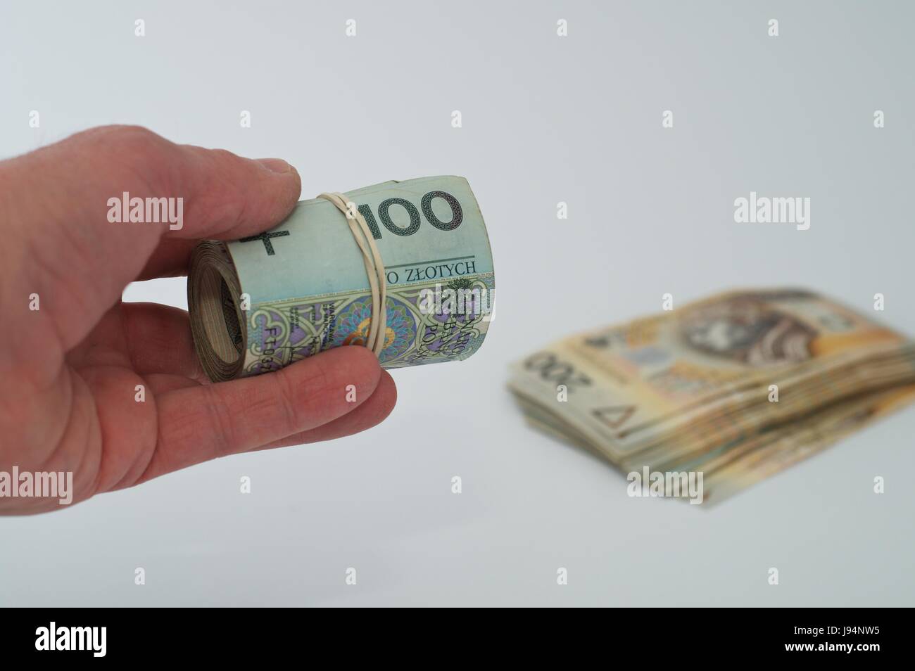 money,banknotes held in the hand Stock Photo - Alamy