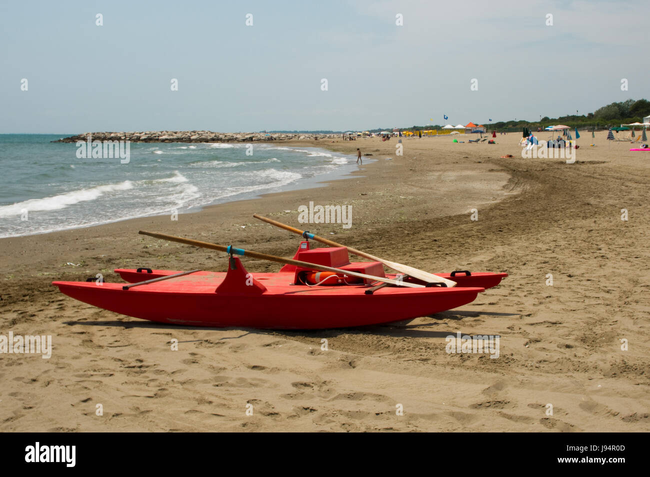 lifeboat lifeguard lifeguards use boat rescue Stock Photo - Alamy