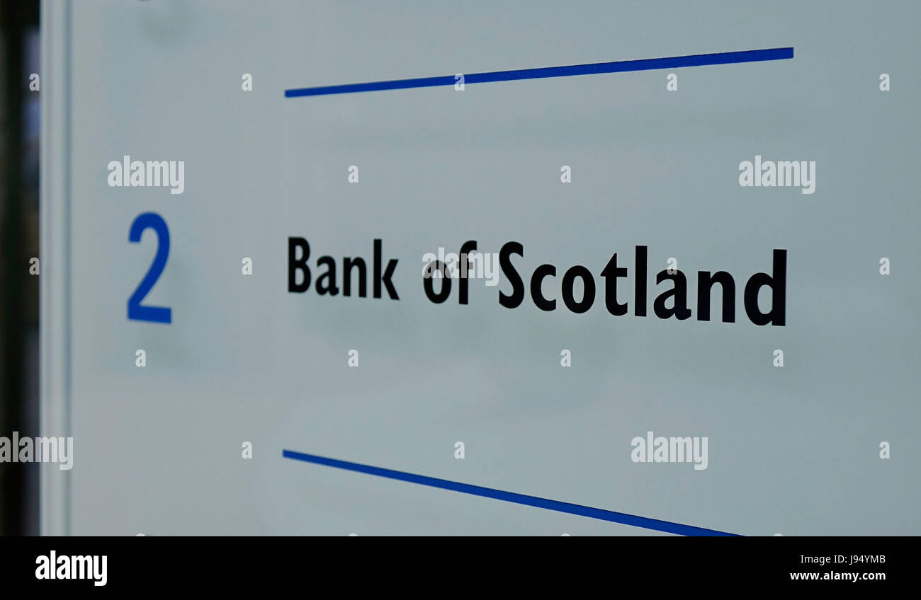 Picture of a sign pointing to the Berlin branch of the Bank of Scotland ...