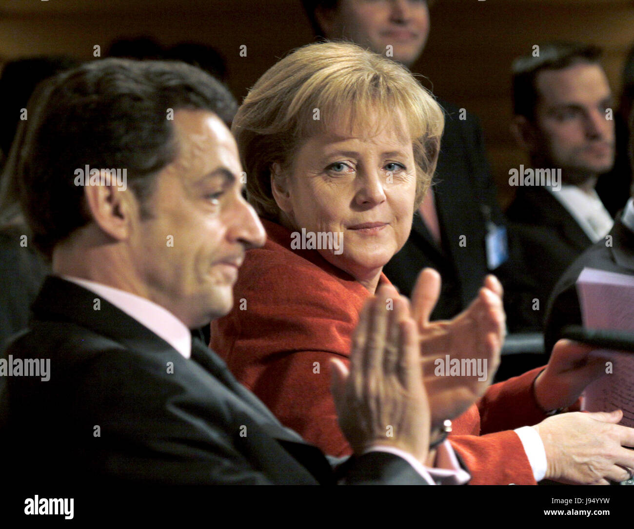 German Chancellor Angela Merkel watches French President Nicolas ...