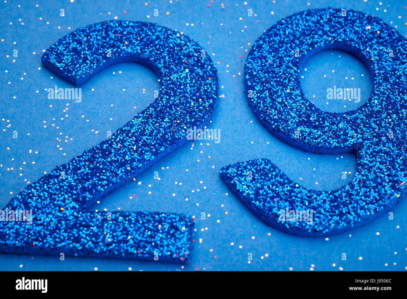 Number twentynine blue color over a blue background. Anniversary ...