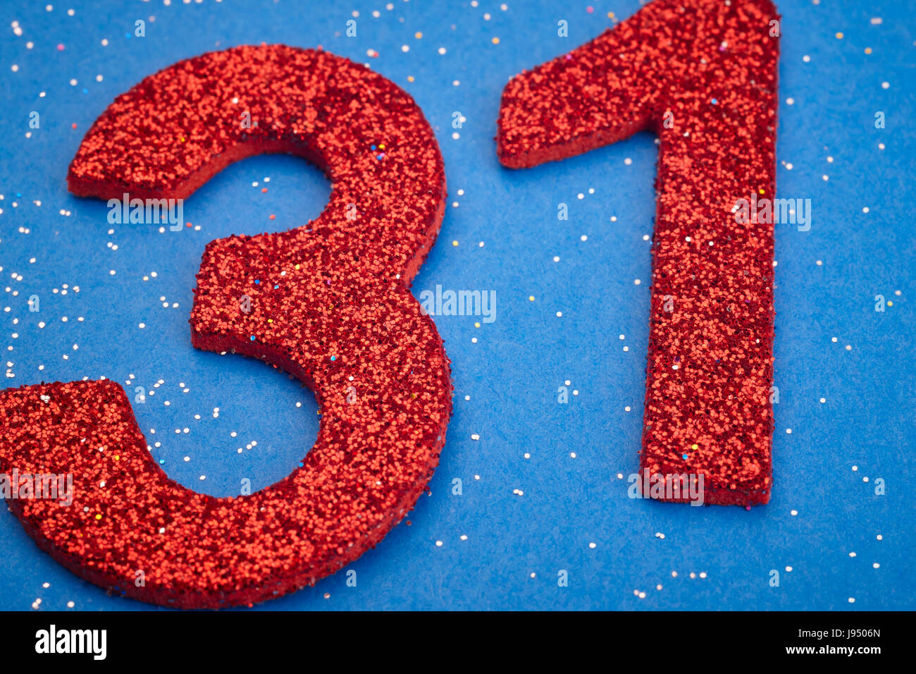 Number thirty one red color over a blue background. Anniversary ...